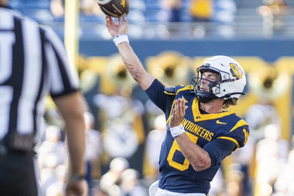 Garrett Greene throws two late TD passes and West Virginia beats Kansas ...